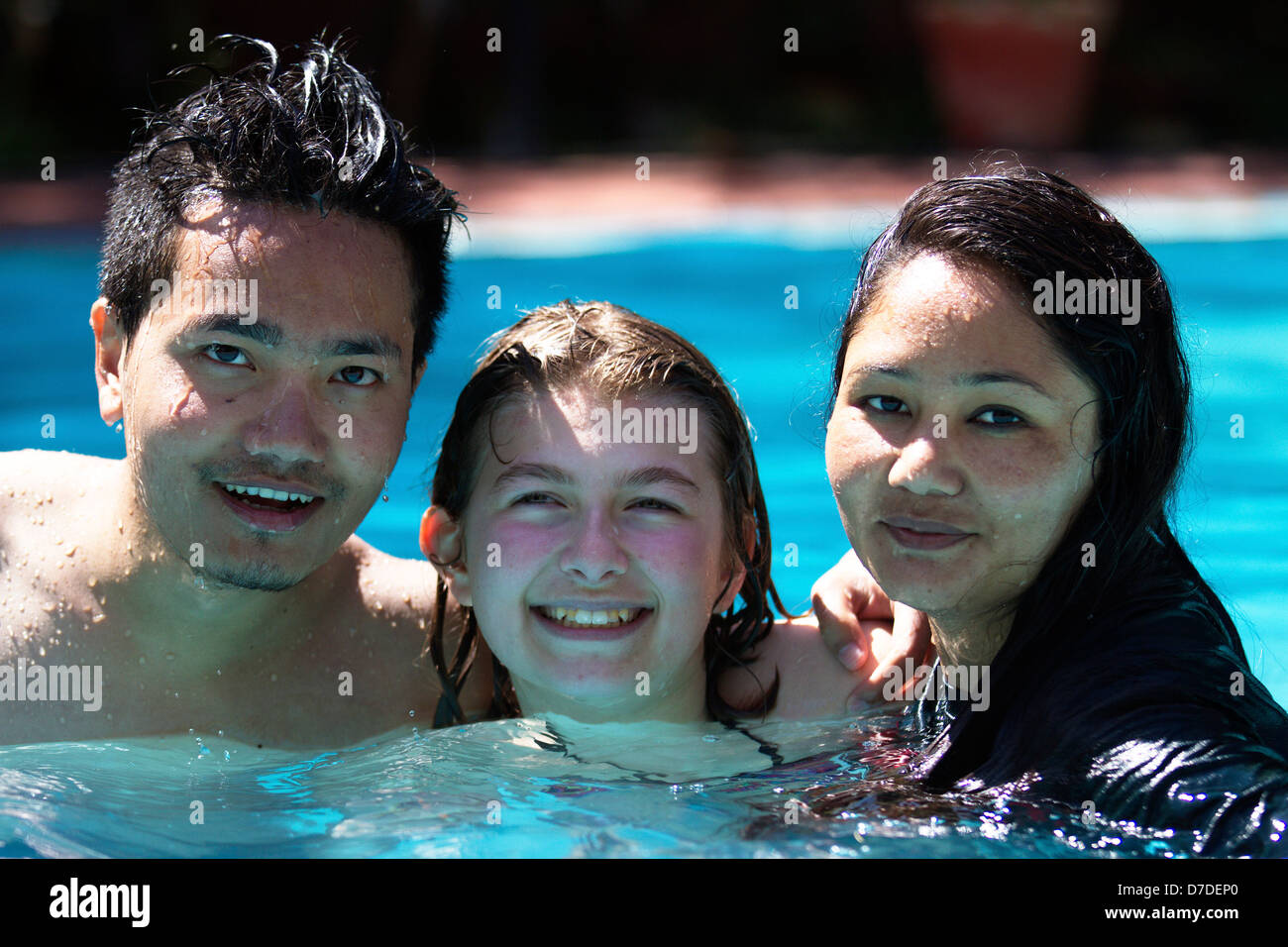 Fun at the pool Stock Photo - Alamy