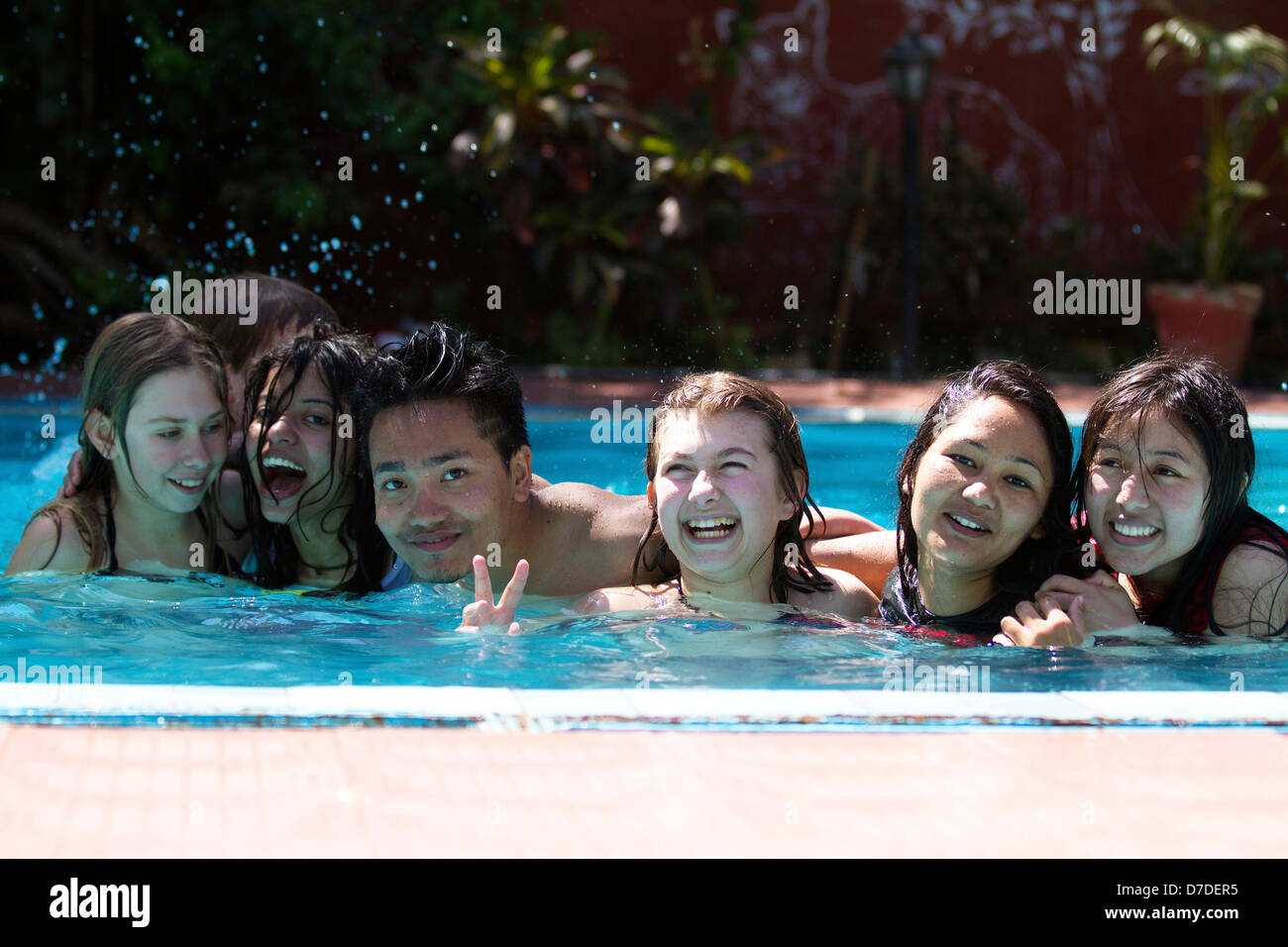 Fun at the pool Stock Photo - Alamy