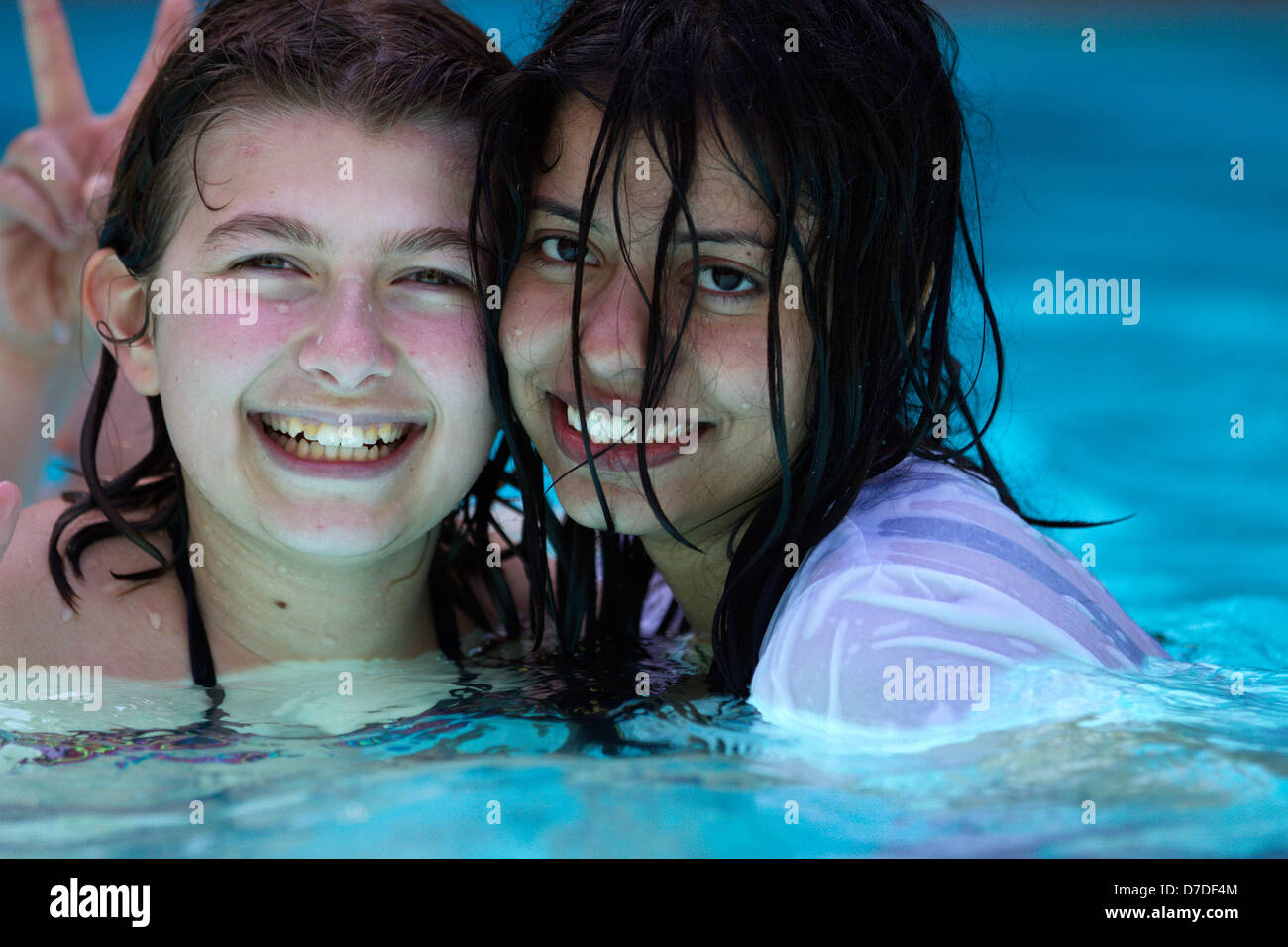 Fun at the pool Stock Photo - Alamy