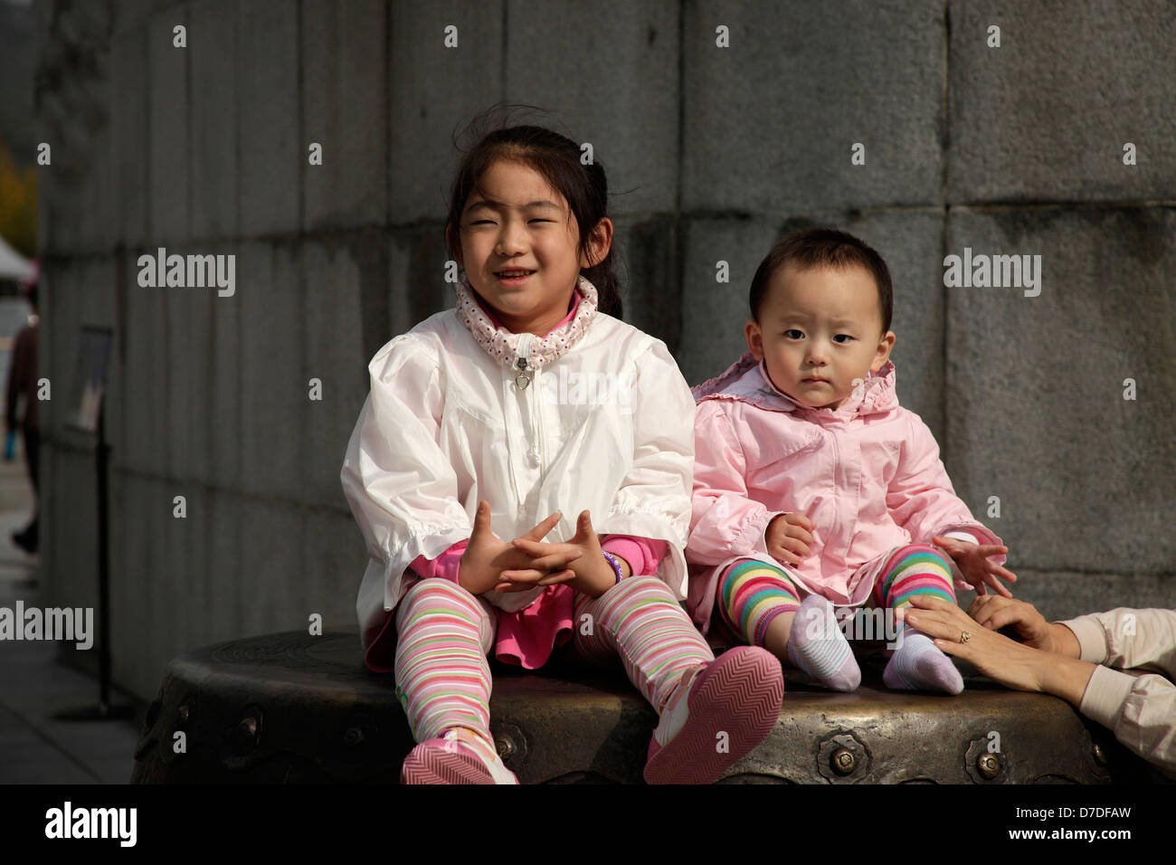 Korean child and baby at Gwanghwamun plaza in downtown Seoul, South ...