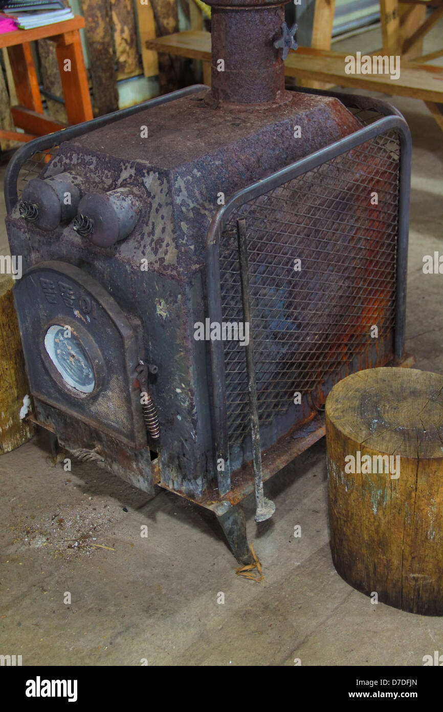 Old rusty room heater Stock Photo - Alamy