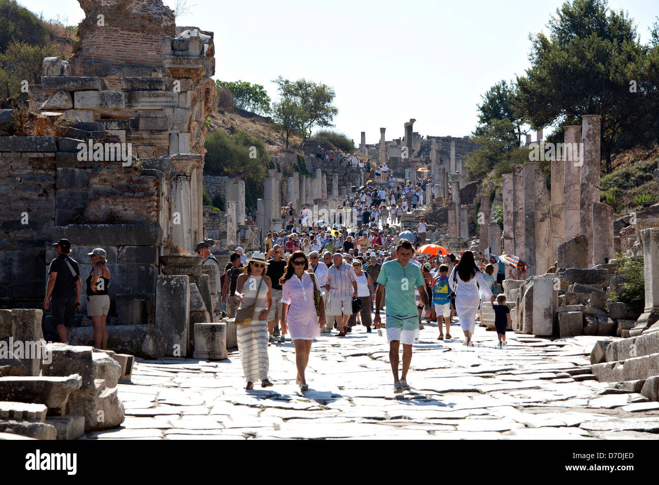 Tourists walking on Kuretes street in Ephesus, Izmir, Turkey Stock ...