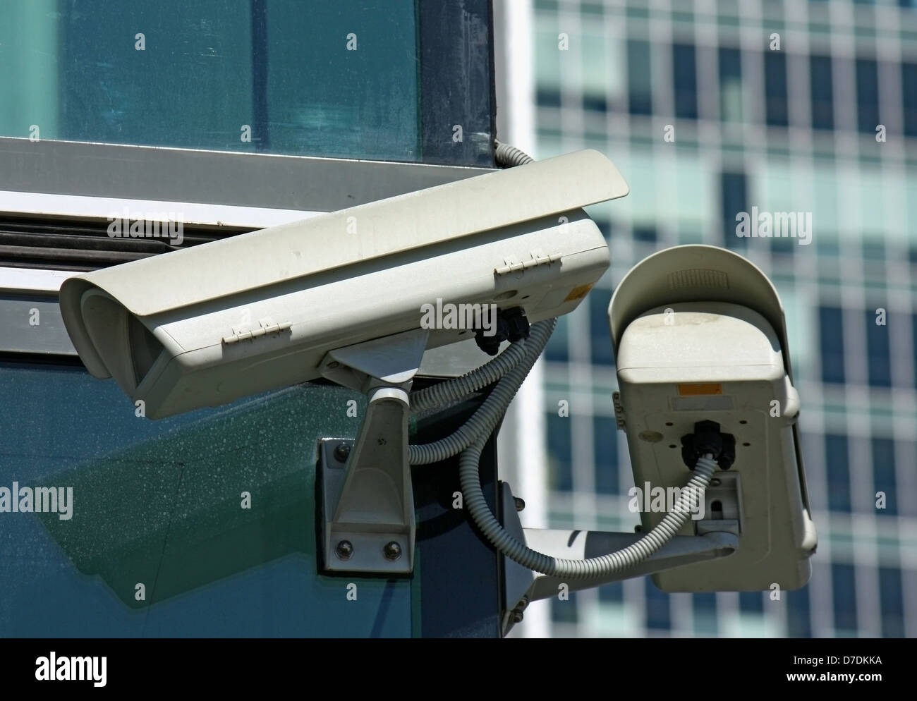 two surveillance cameras and glass Stock Photo - Alamy