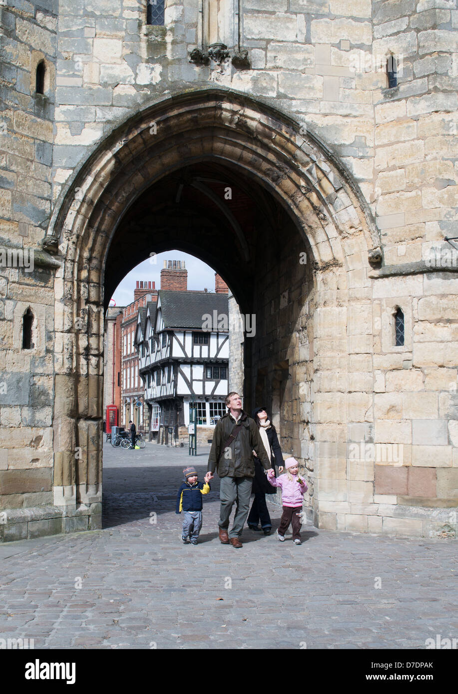 Boy walking through gate hi-res stock photography and images - Alamy