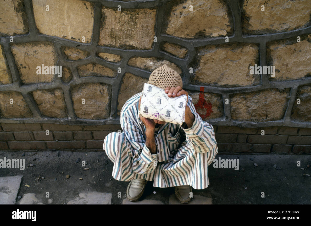 Man hiding face from camera hi-res stock photography and images - Alamy