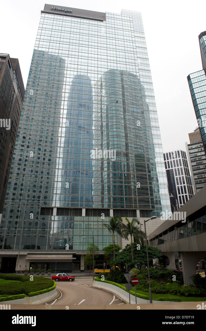 JP Morgan building in Central, Hong Kong. Relections of Jardine House ...