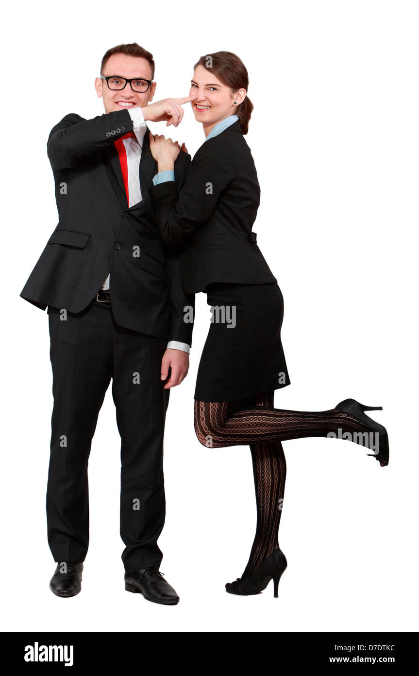 Young Business Couple Having Fun While Posing Against A White