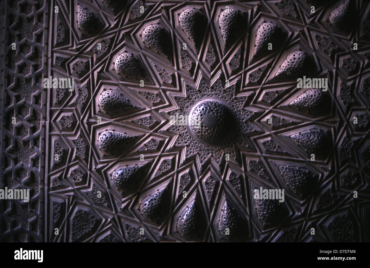 Arabesque ornament carving detail of the bronze gates at Sultan al-Mu ...