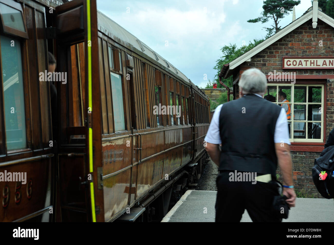 steam train,Goathland railway station.carriages,signal box,guard ...
