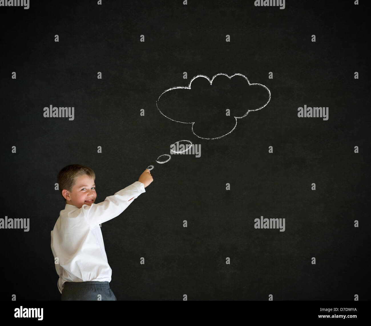 Writing boy dressed up as business man with thought thinking chalk ...