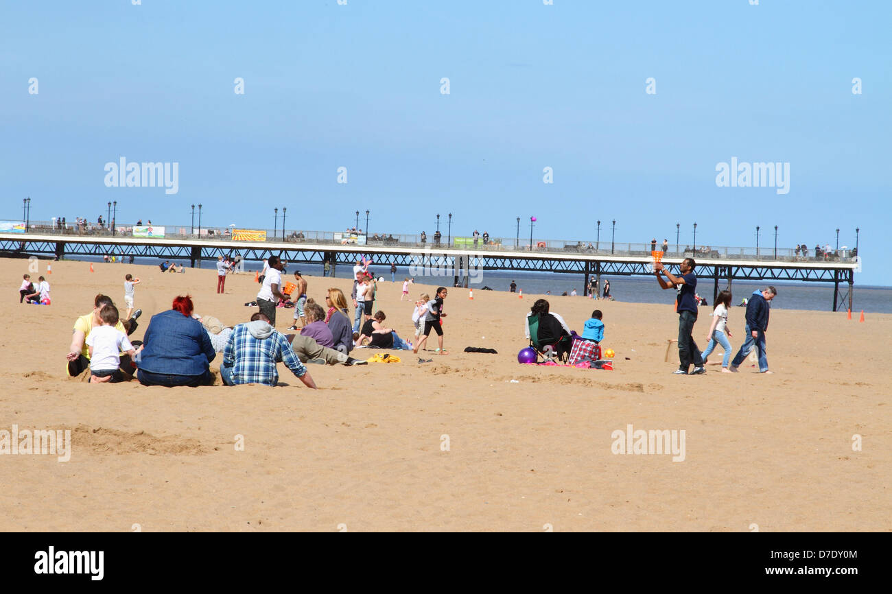 Skegness, UK. 5th May, 2013. Sun lovers making most of the sunshine and ...