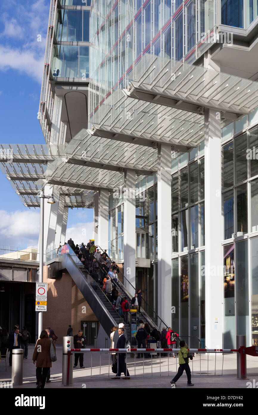 At the base of The Shard in the late afternoon, commuters walking to ...