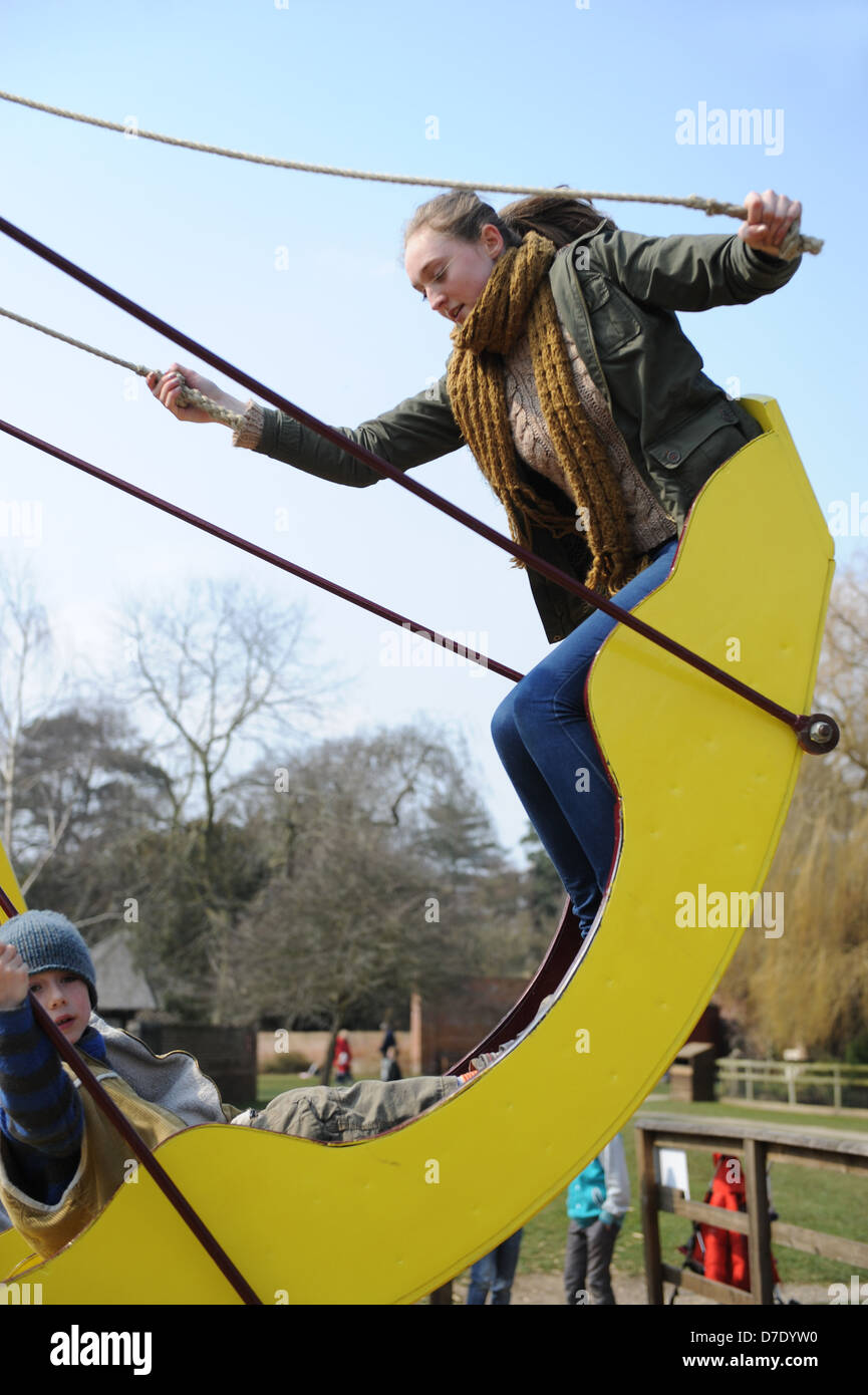 Yellow ride on playground hi-res stock photography and images - Alamy