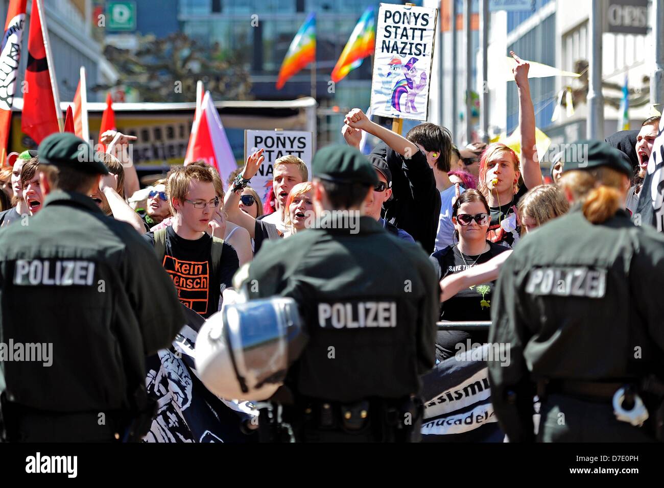 Leftist demonstrators stage a sit-in to protest against a rally by 'Pro ...