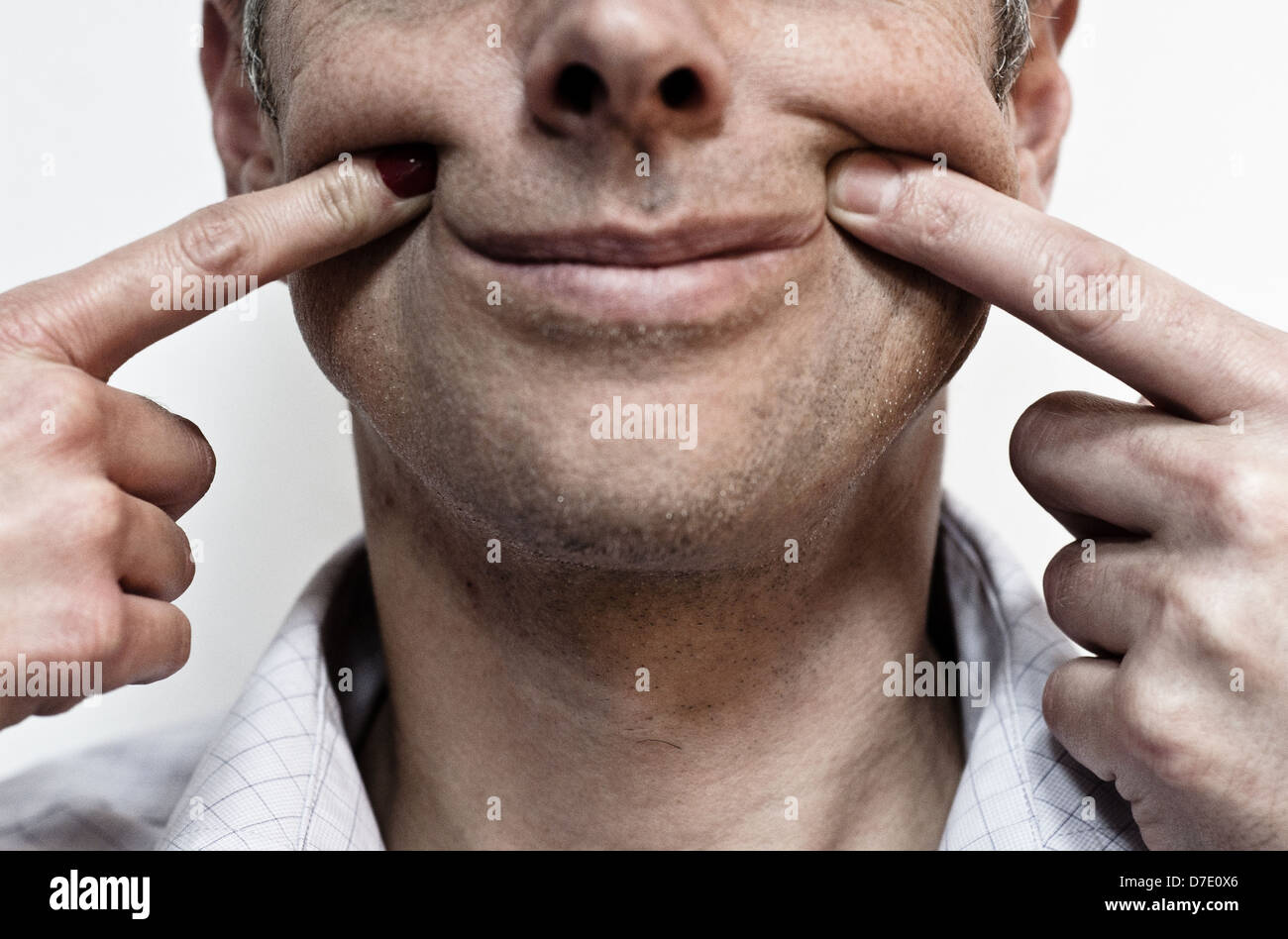 Forced smile hi-res stock photography and images - Alamy