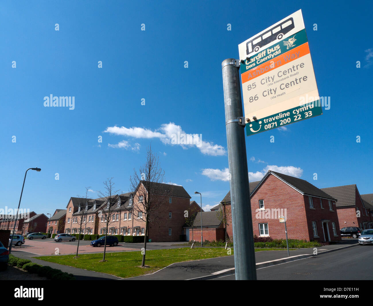 Bus stop sign and new Bellway housing development Parc Ty Glas ...