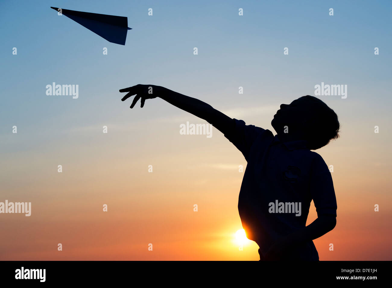 Boy Flying Paper Airplane High Resolution Stock Photography and Images ...
