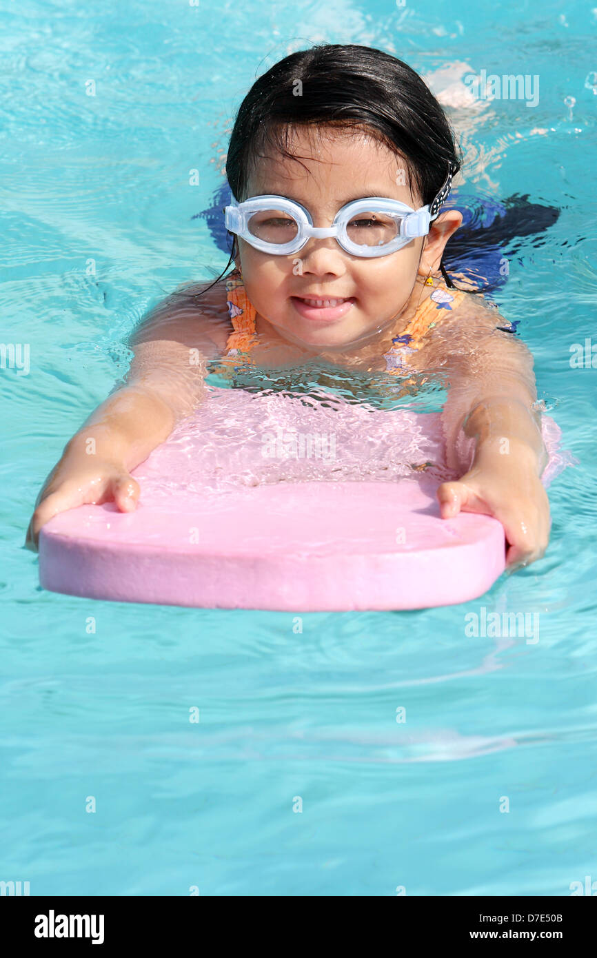 Child learning to swim Stock Photo - Alamy