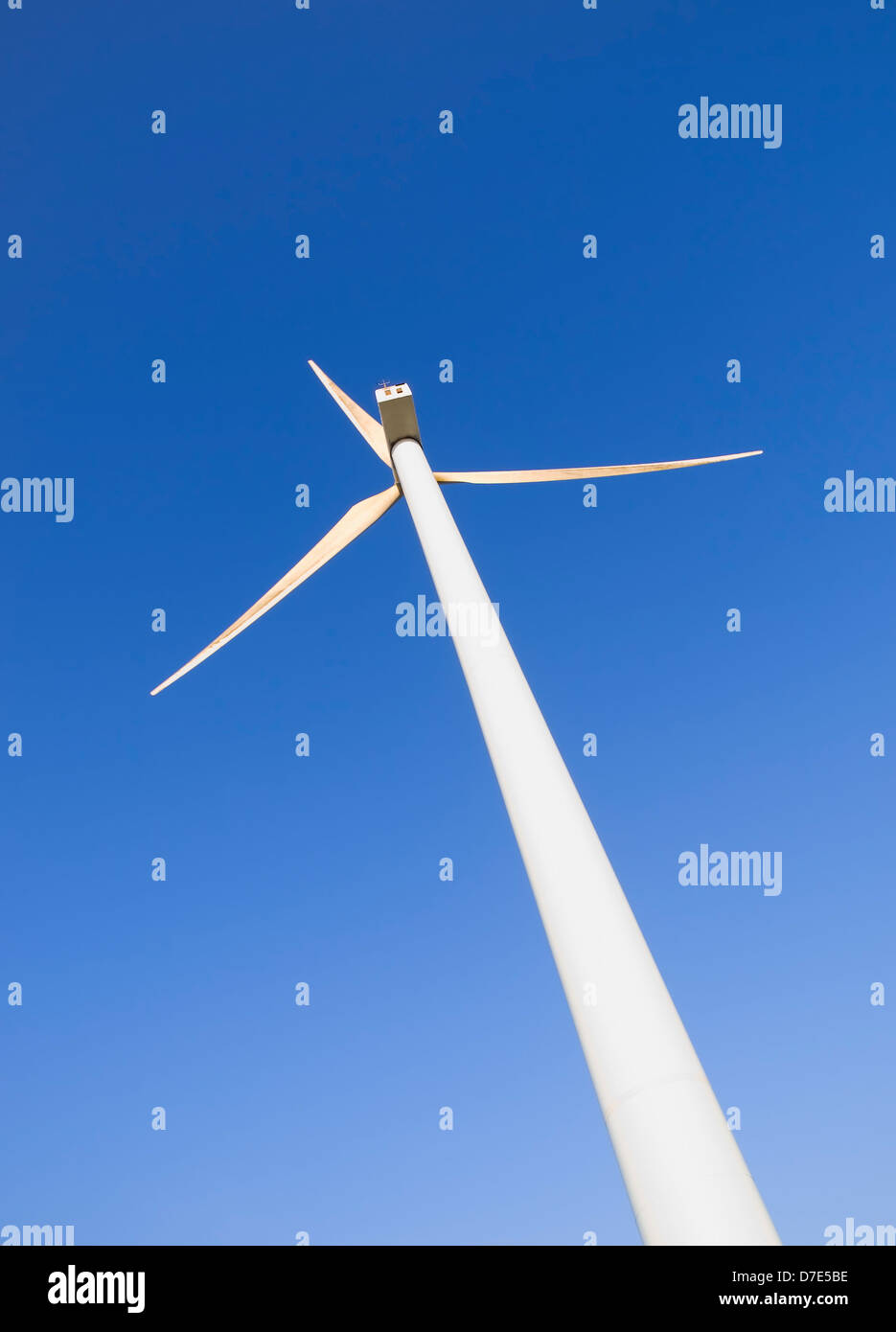 Wind turbine on blue sky in nature and diagonal composition Stock Photo ...