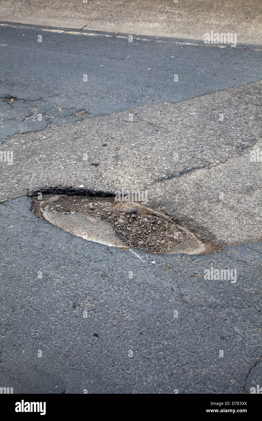 Tarmac roads with potholes hi-res stock photography and images - Alamy