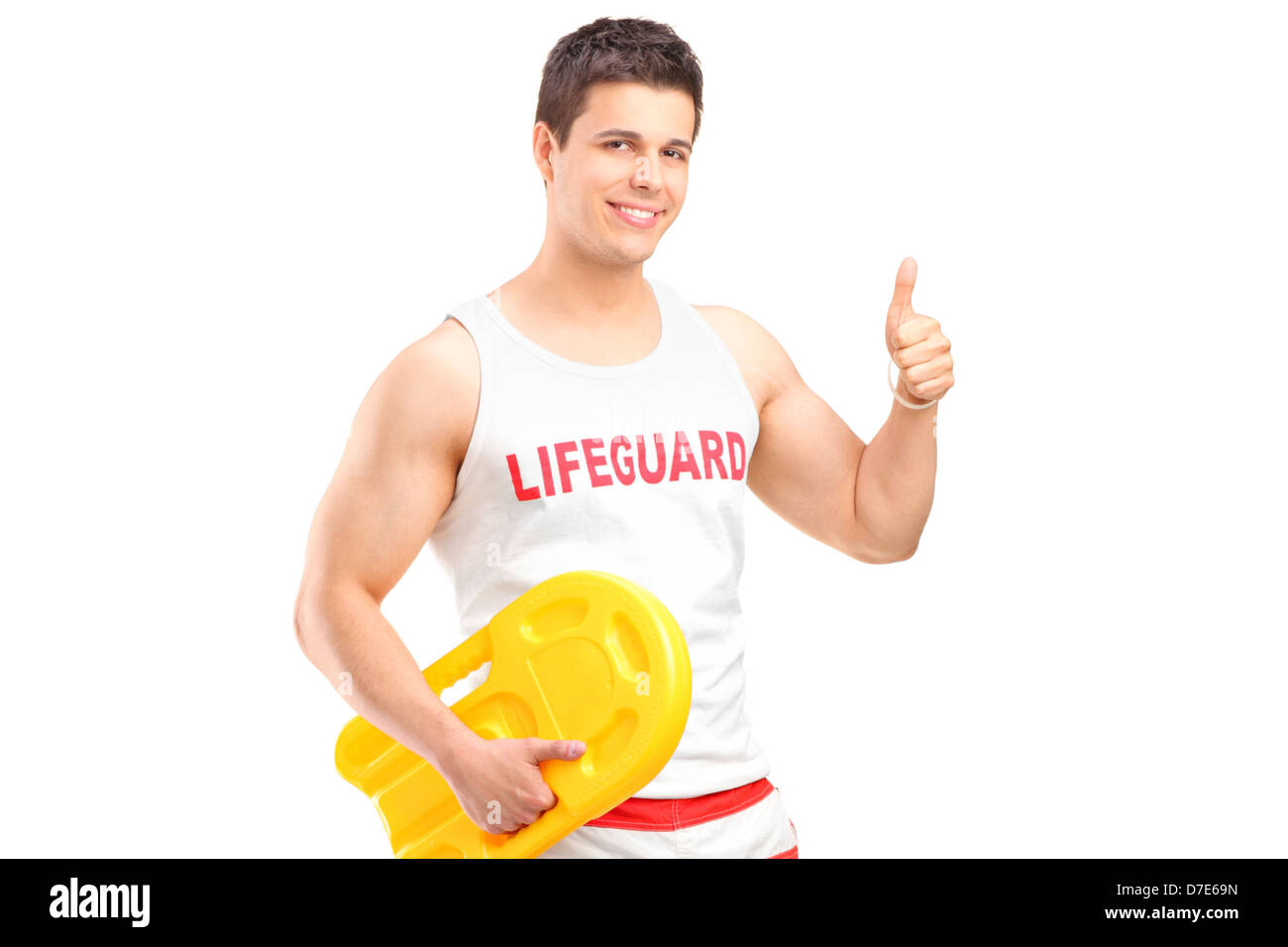 A happy lifeguard on duty giving a thumb up isolated on white ...