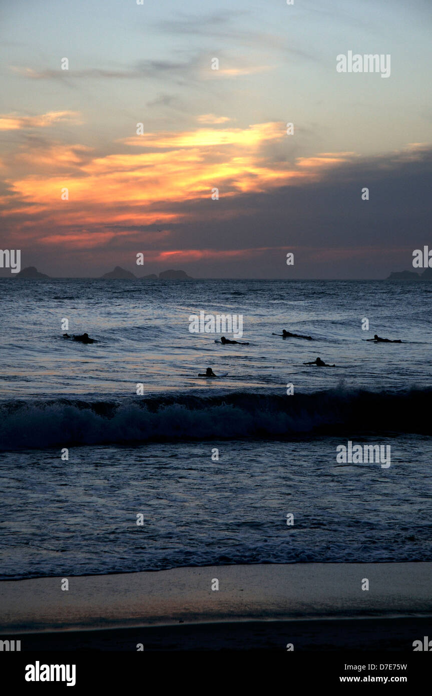Surfers at Susnet at Ipanema Beach Stock Photo - Alamy
