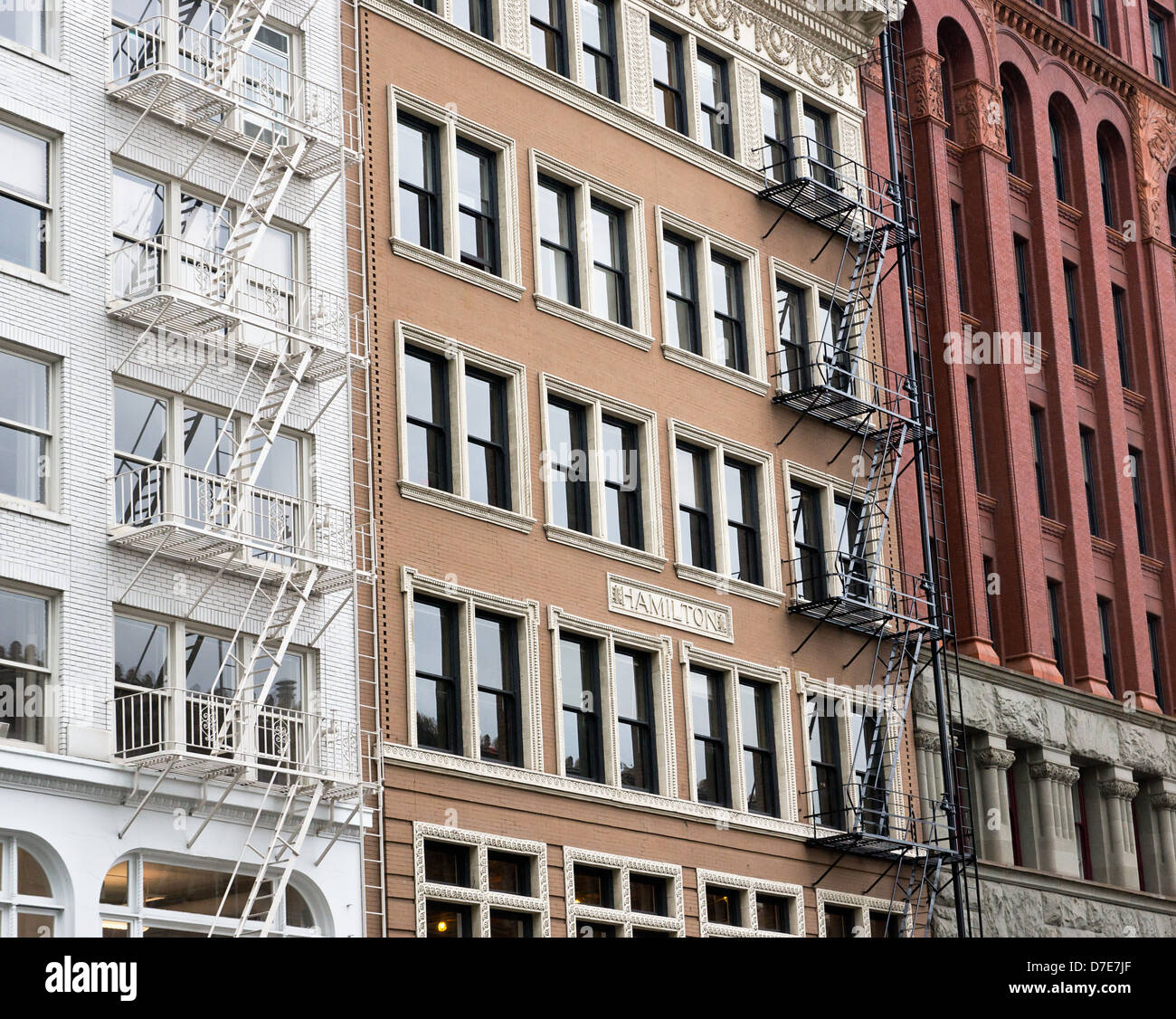 a line of buildings with traditional Portland architecture on the ...