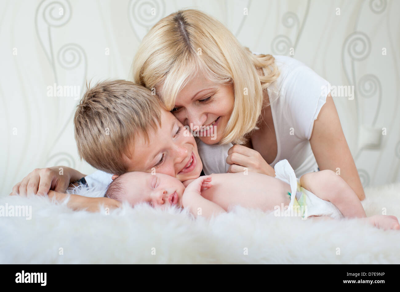 happy family with newborn baby at home Stock Photo - Alamy