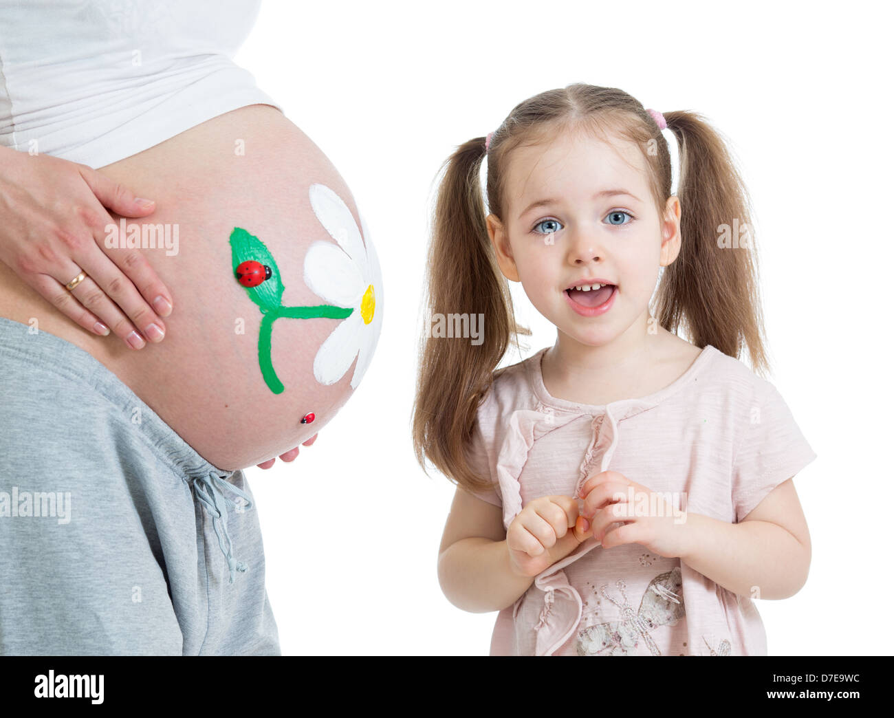 cute kid girl decorating mother's belly Stock Photo - Alamy