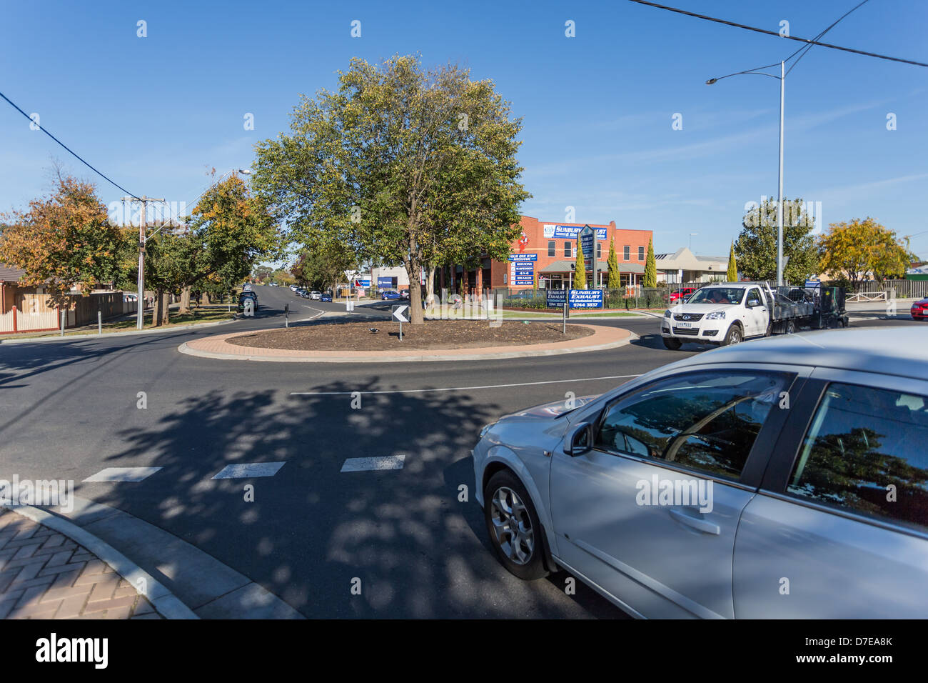 Car driving round roundabout hi-res stock photography and images - Alamy
