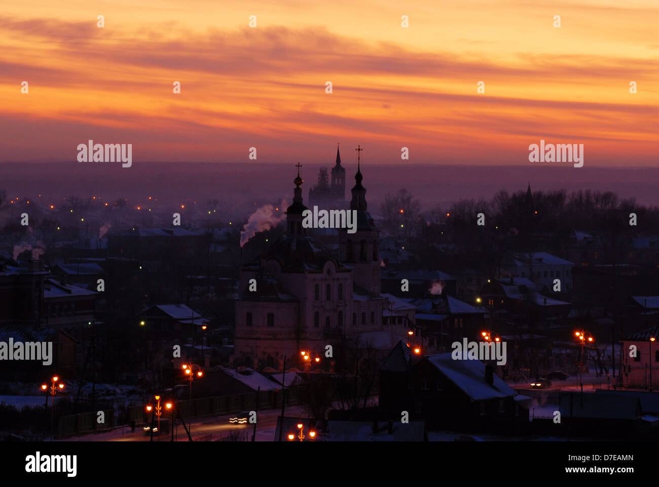 Winter mist at the sunset over the old Siberian town Tobolsk. Russia ...