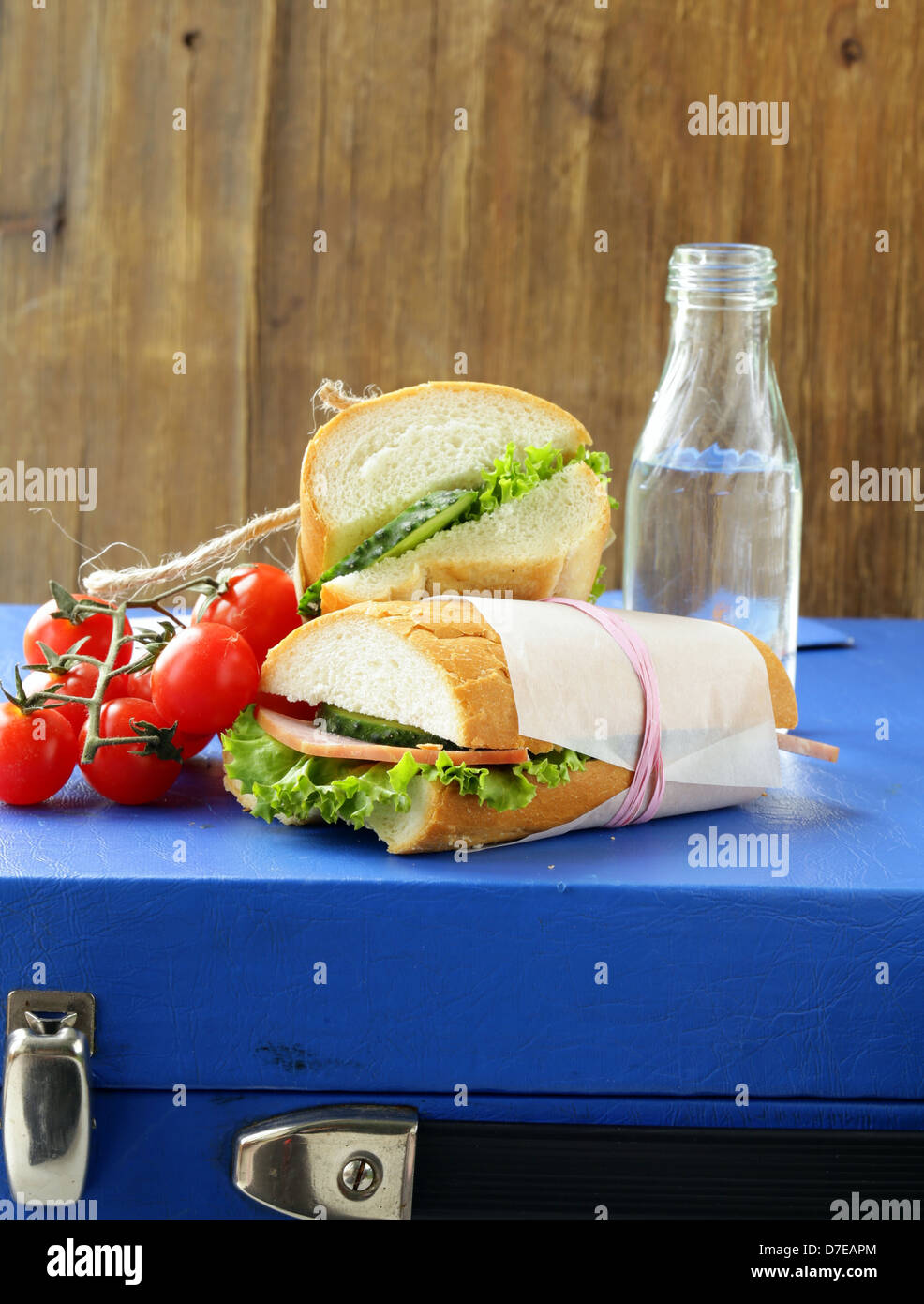 snack sandwiches (panini) with vegetables and ham Stock Photo - Alamy