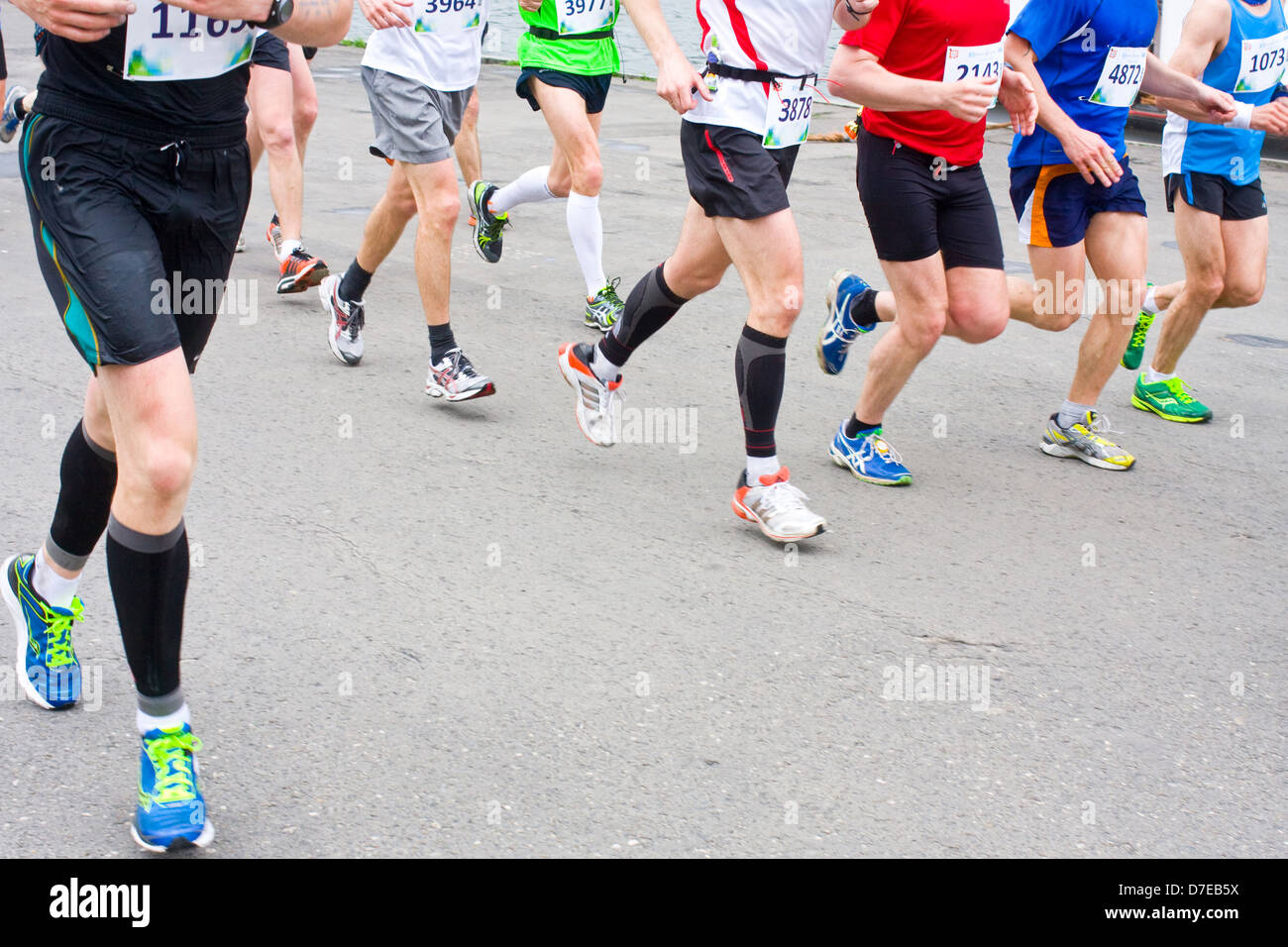 detail of the legs of runners at the start of a marathon race Stock ...