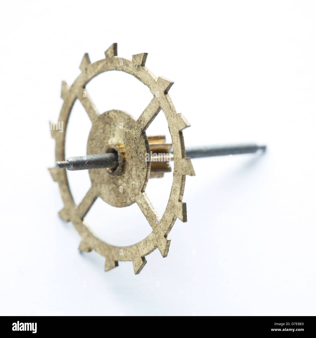 Cogwheel of clock on white background Stock Photo - Alamy