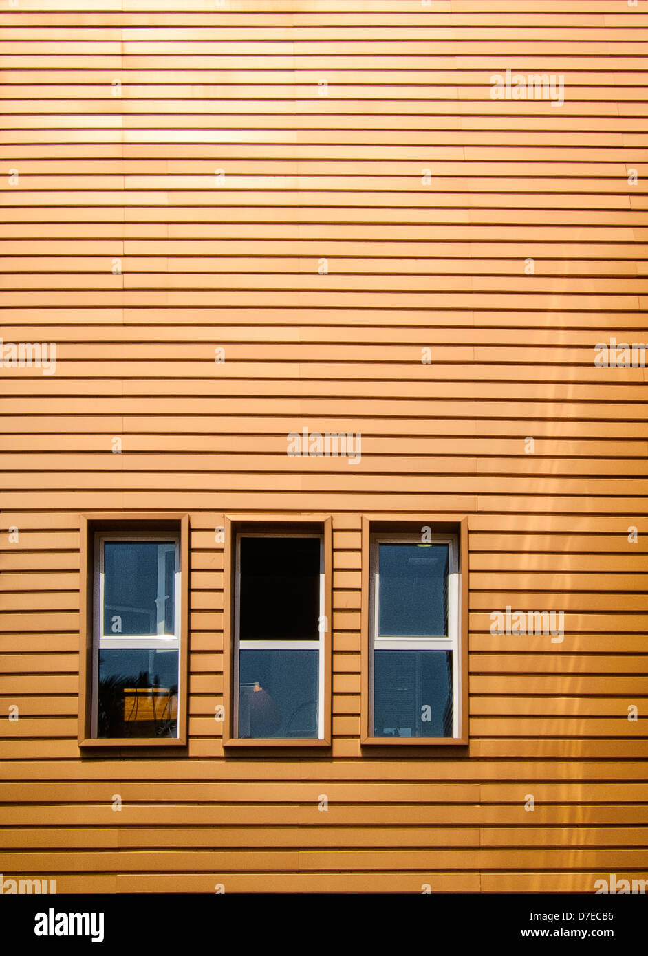 Three windows in a wooden house Stock Photo - Alamy