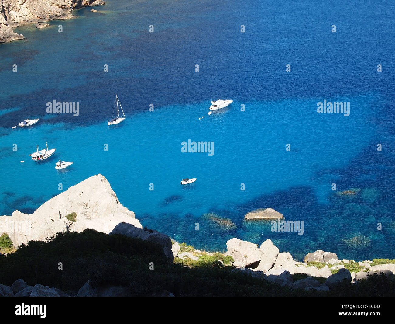 A colorful sea in a bay in Majorca Stock Photo - Alamy
