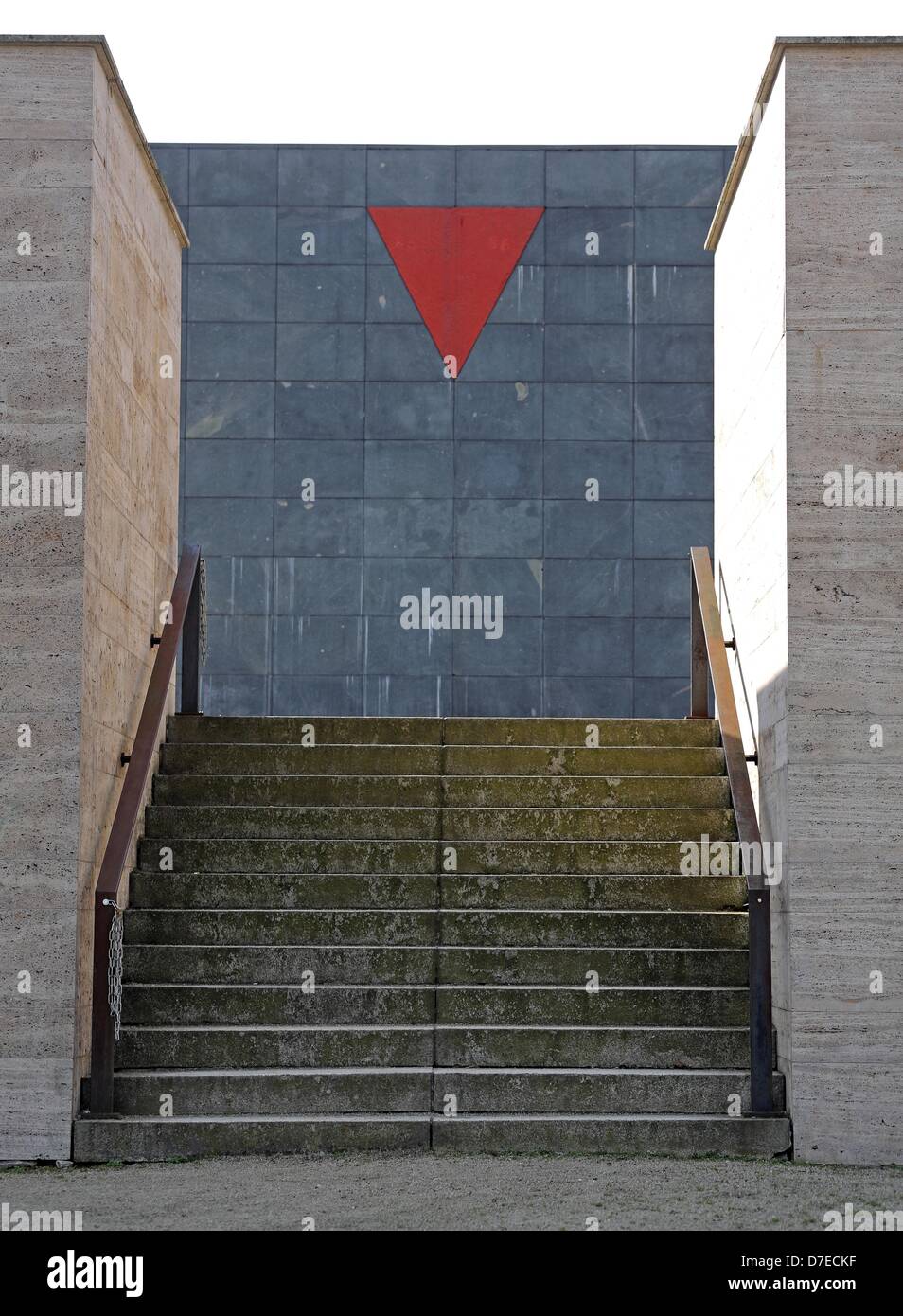 A red triangle is seen on the back of the memorial to the victims of ...
