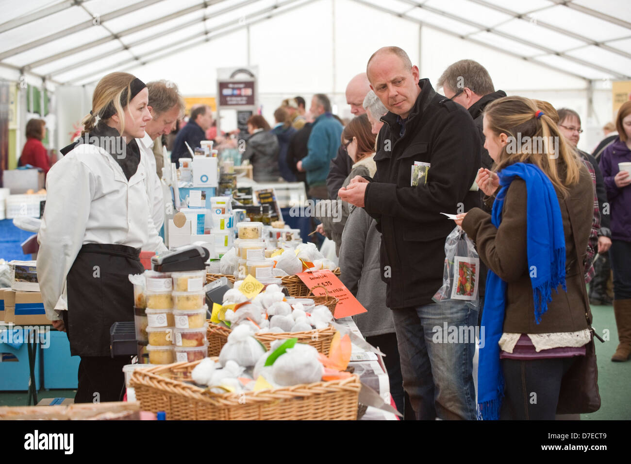 Visitors browse stalls and sample food at Exeter Festival of South West ...