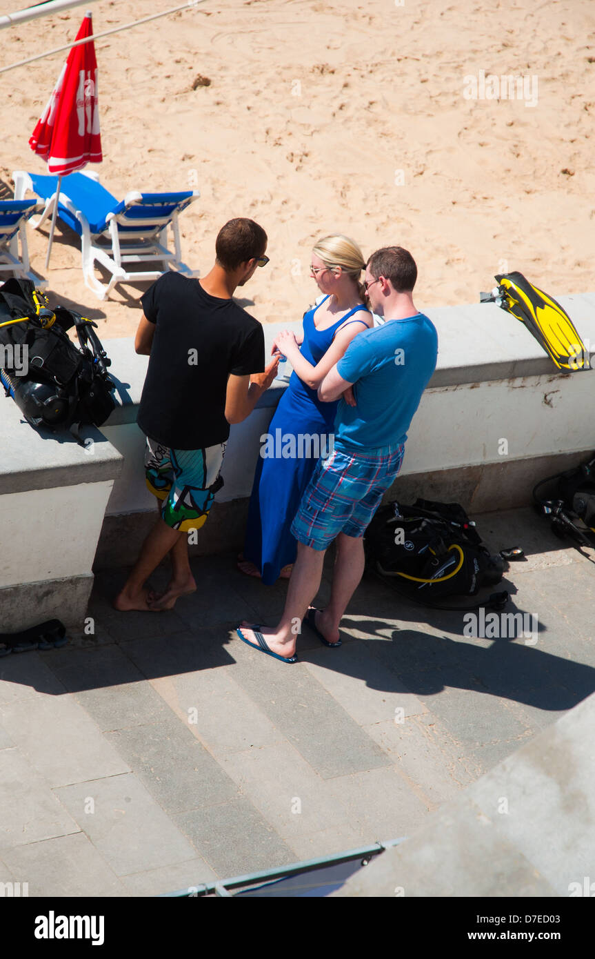 Three people diving hi-res stock photography and images - Alamy