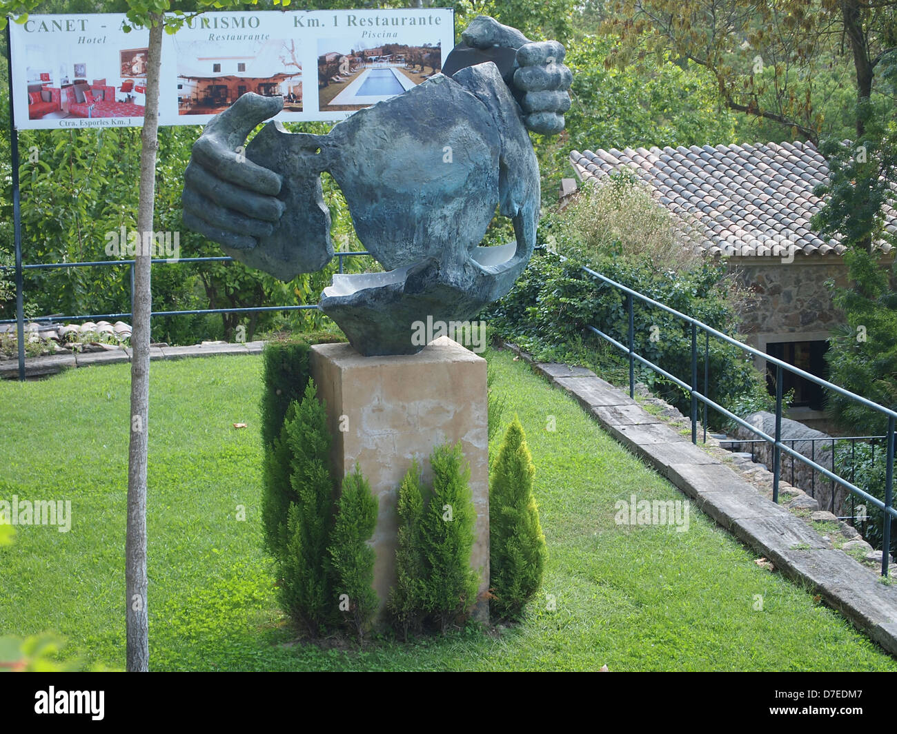 A statue on a cuboid in La granja in Majorca Stock Photo - Alamy