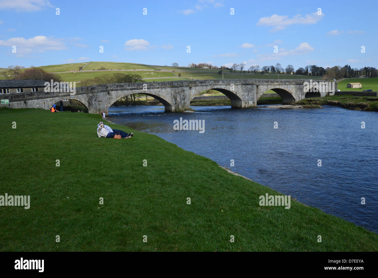 The five arched road bridge over the River Wharfe in Burnsall on the ...