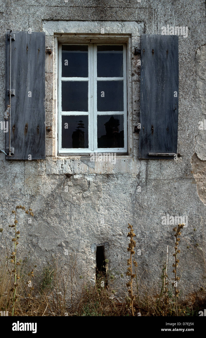 Ancient window and shutters in stone cottage wall, Languedoc, France ...