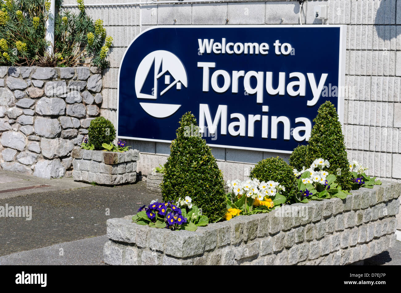 Sign to welcome visitors to Torquay marina Stock Photo - Alamy