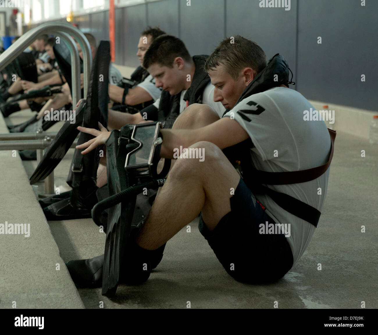 Search and rescue swimmers don equipment Stock Photo - Alamy