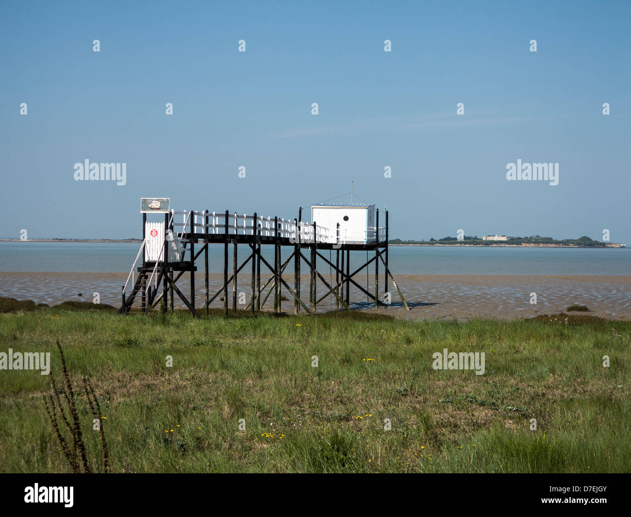 Carrelets fishing huts on stilts on the beach at Fouras, Charente ...