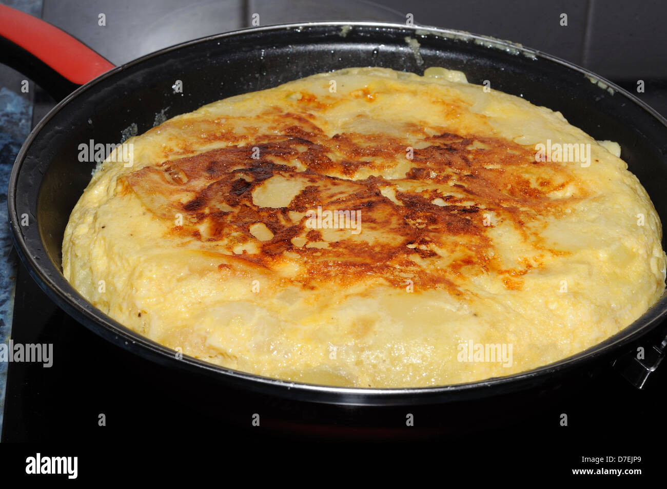 Homemade Spanish tortilla in a traditional tortilla pan, Andalusia ...