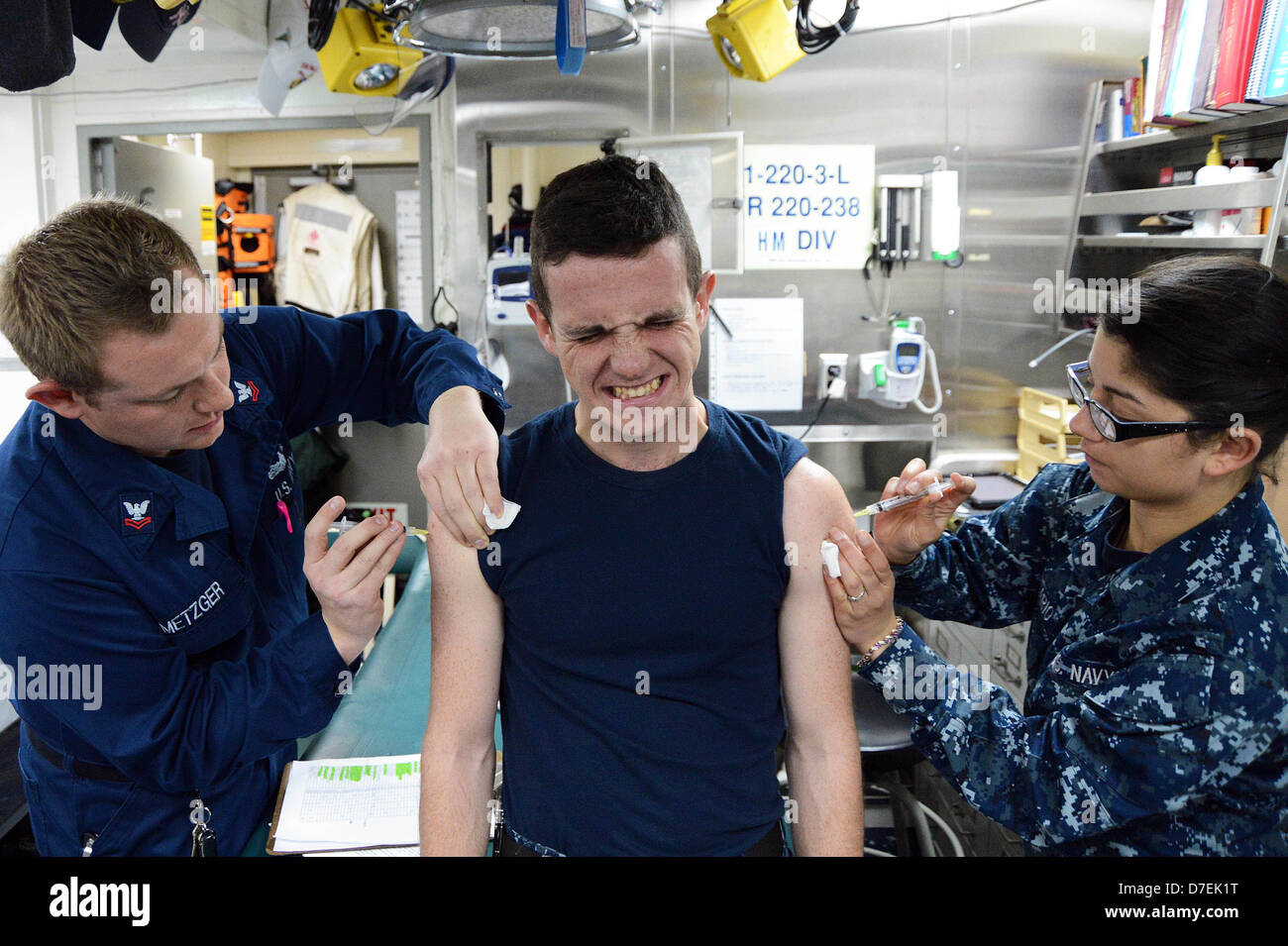 Sailors provide immunizations at sea Stock Photo - Alamy