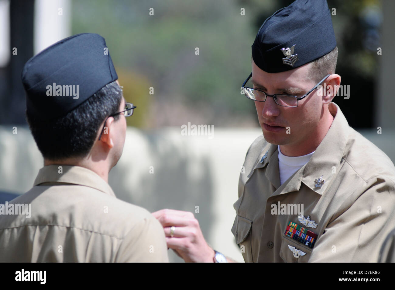 A Sailor conducts a uniform inspection Stock Photo - Alamy