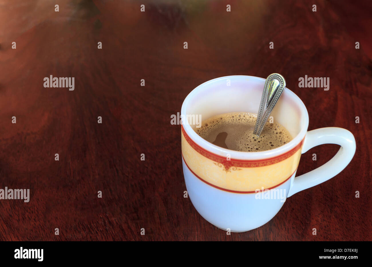 Coffee on desk in morning Stock Photo - Alamy