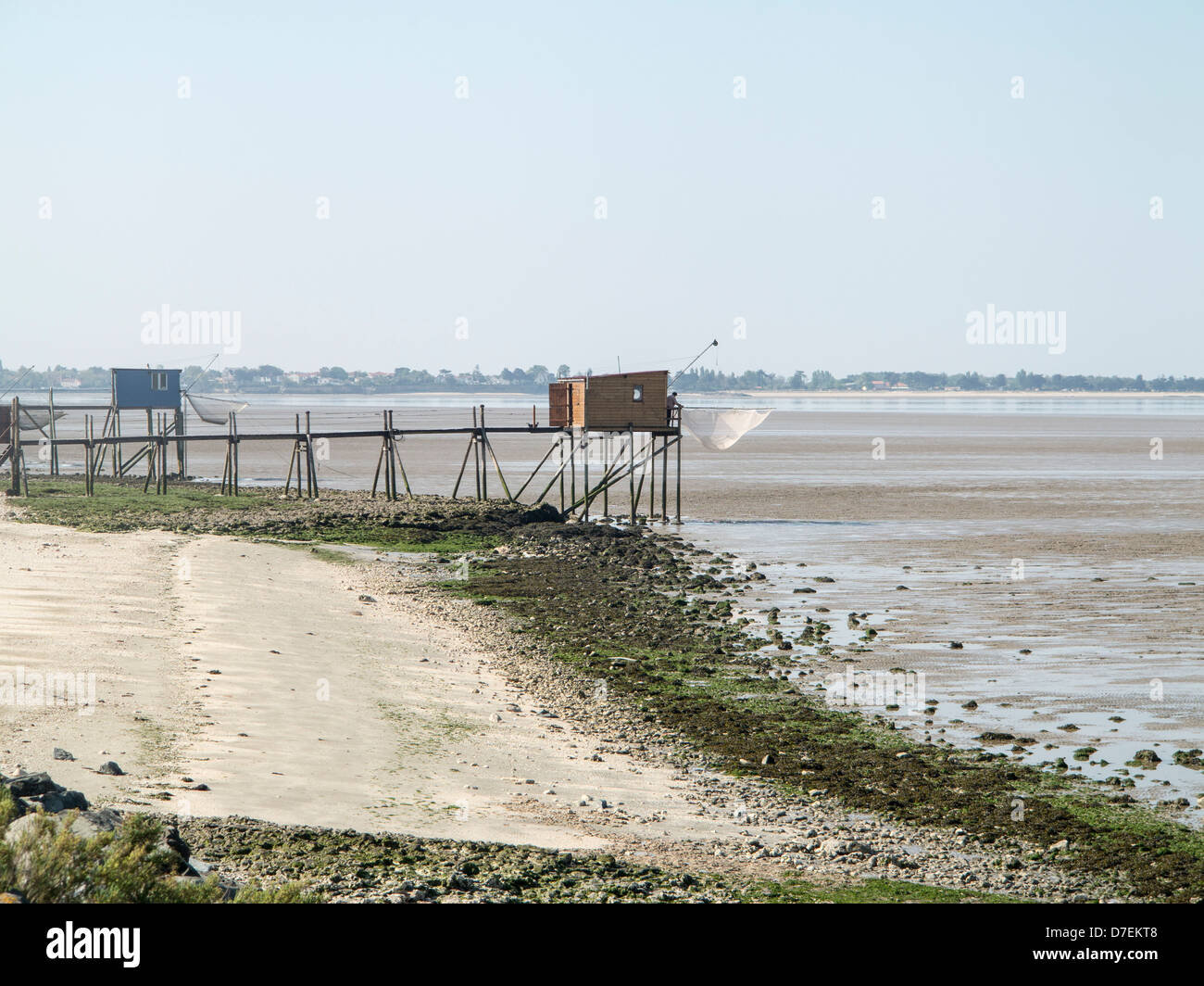 Carrelets fishing huts on stilts on the beach at Fouras, Charente ...